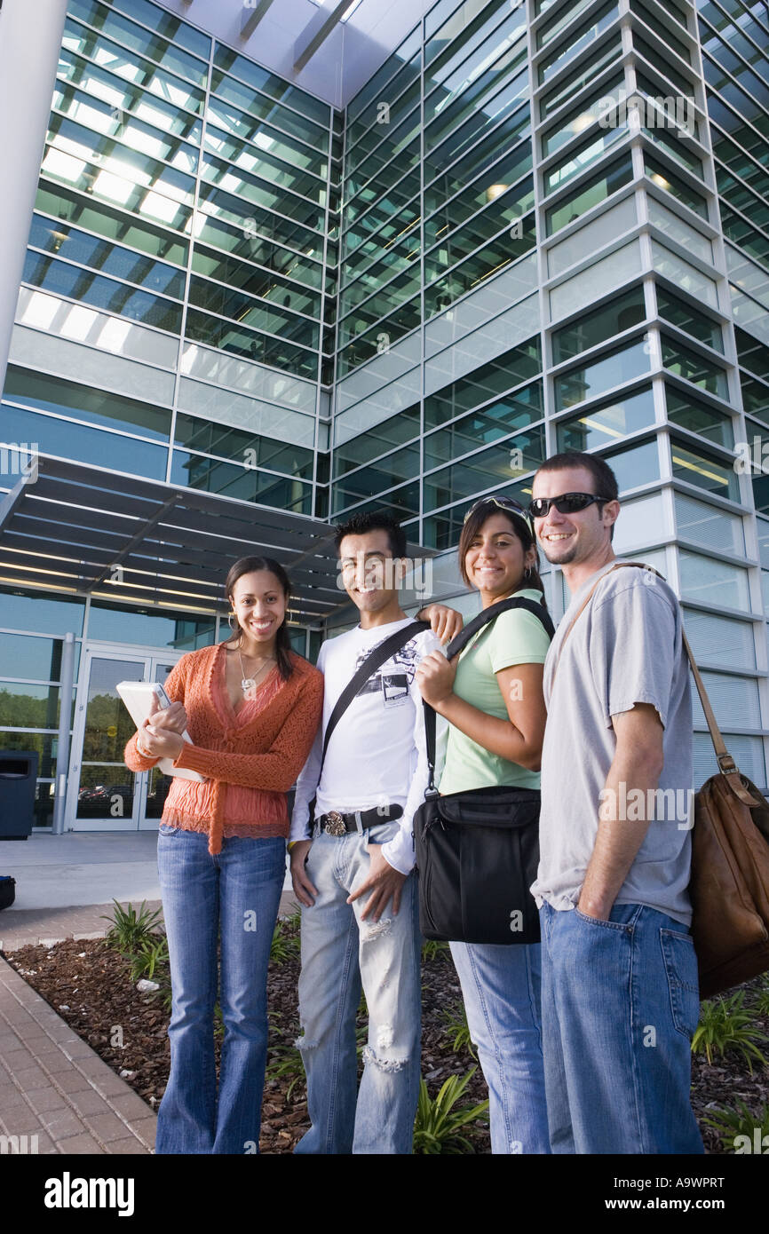 College students standing in front of a building Stock Photo - Alamy