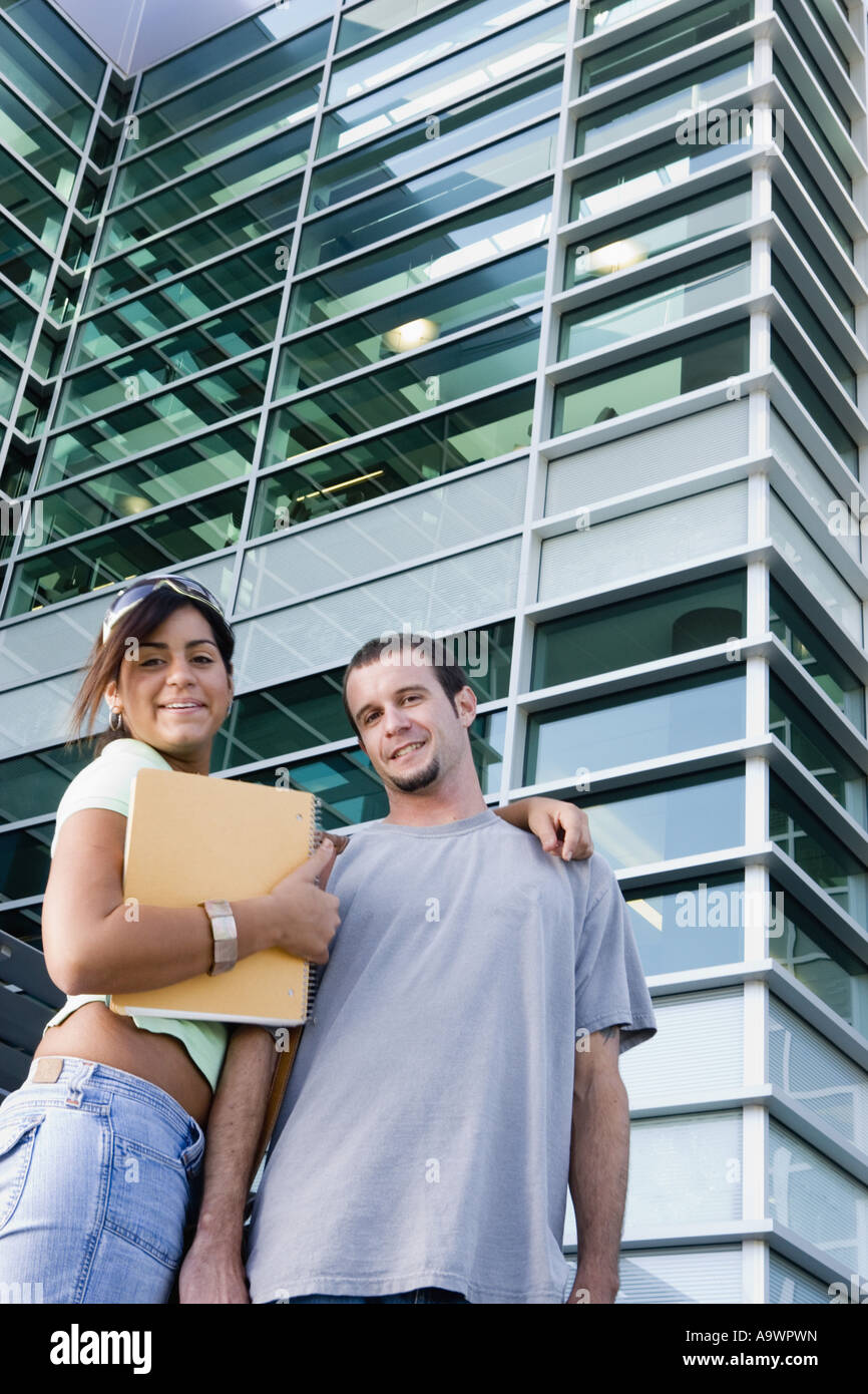 University students standing outside campus building Stock Photo - Alamy