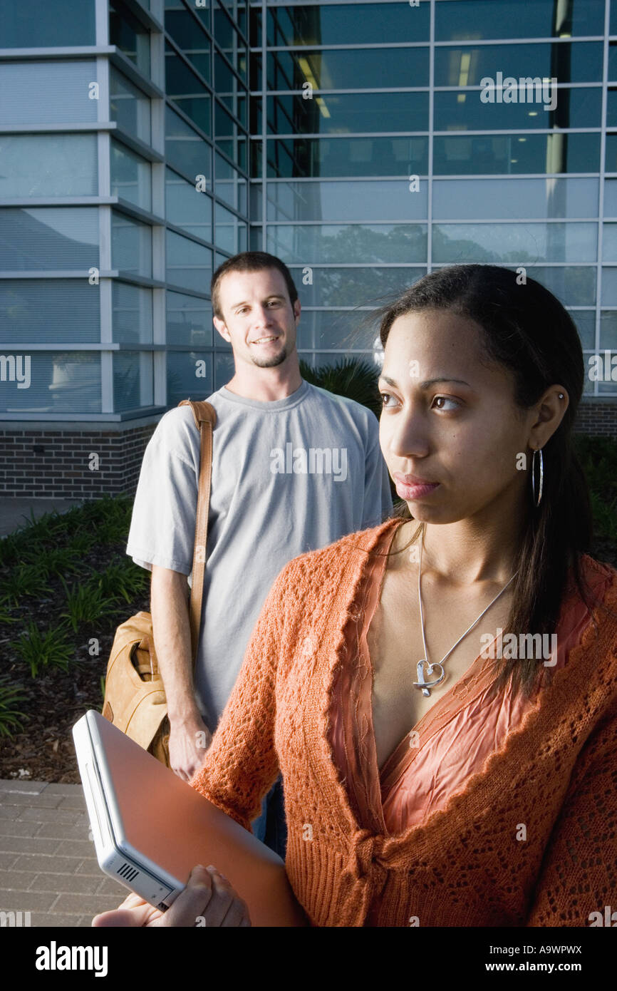 University students standing outside campus building Stock Photo - Alamy