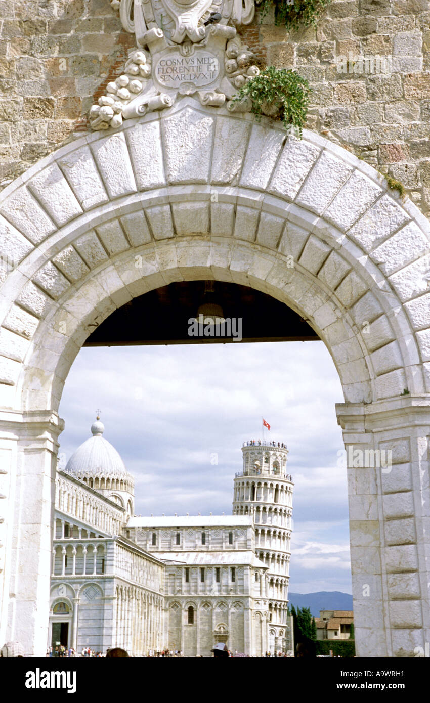 Italy, Tuscany, Duomo and Leaning tower of Pisa through arched gate ...