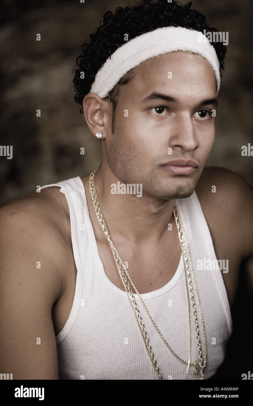 Head-shot of young man in hip-hop fashion Stock Photo - Alamy