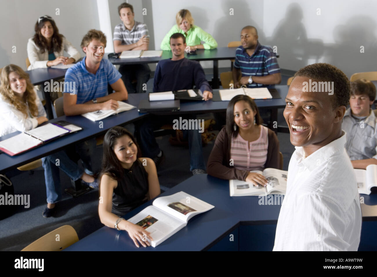 Elevated view of a teacher and students in the classroom Stock Photo ...