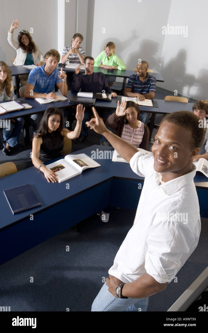 Elevated view of a teacher and students in the classroom Stock Photo ...
