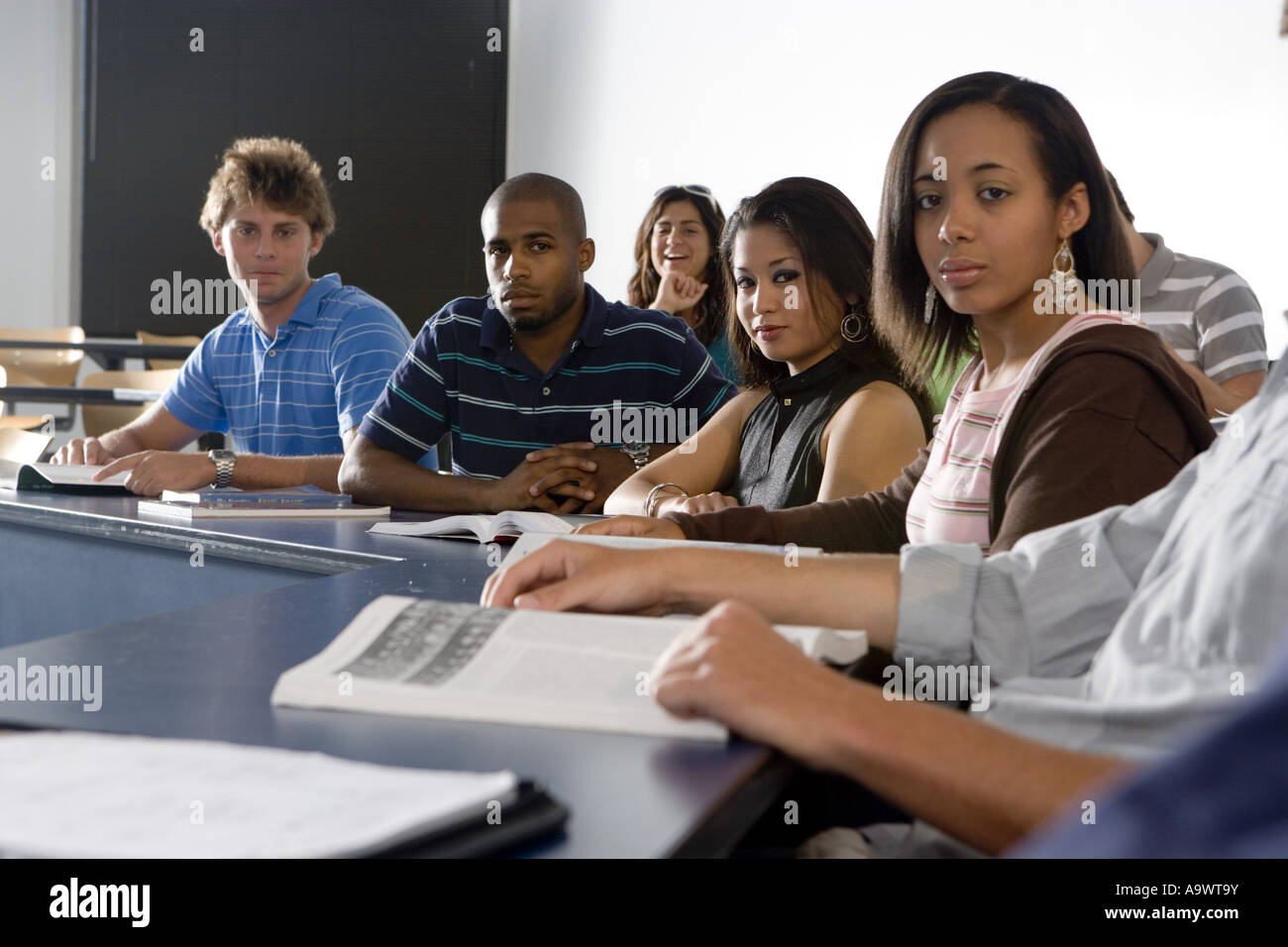 Portrait of students sitting in the classroom Stock Photo - Alamy