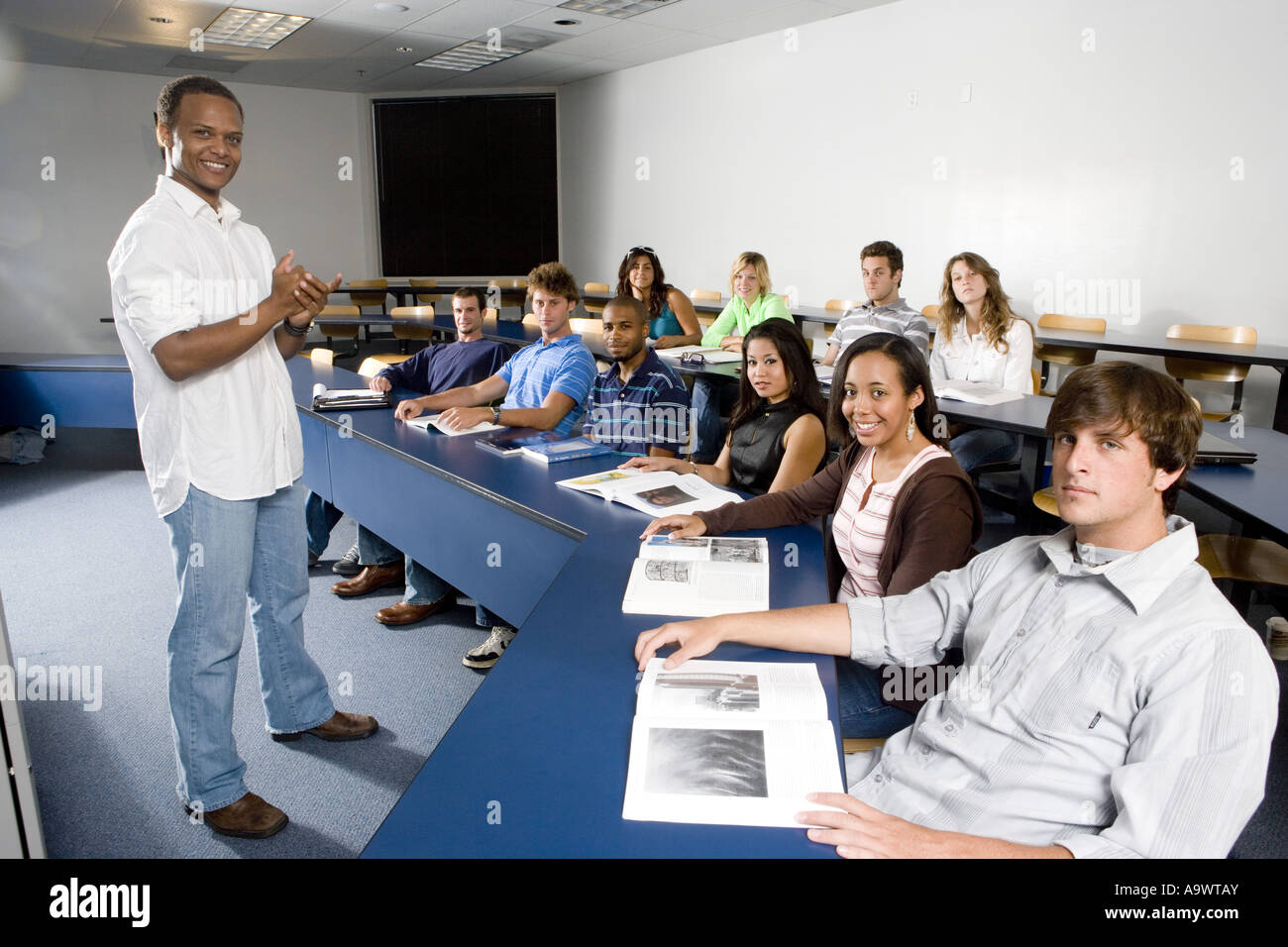 Portrait of Teacher and students in the classroom Stock Photo - Alamy