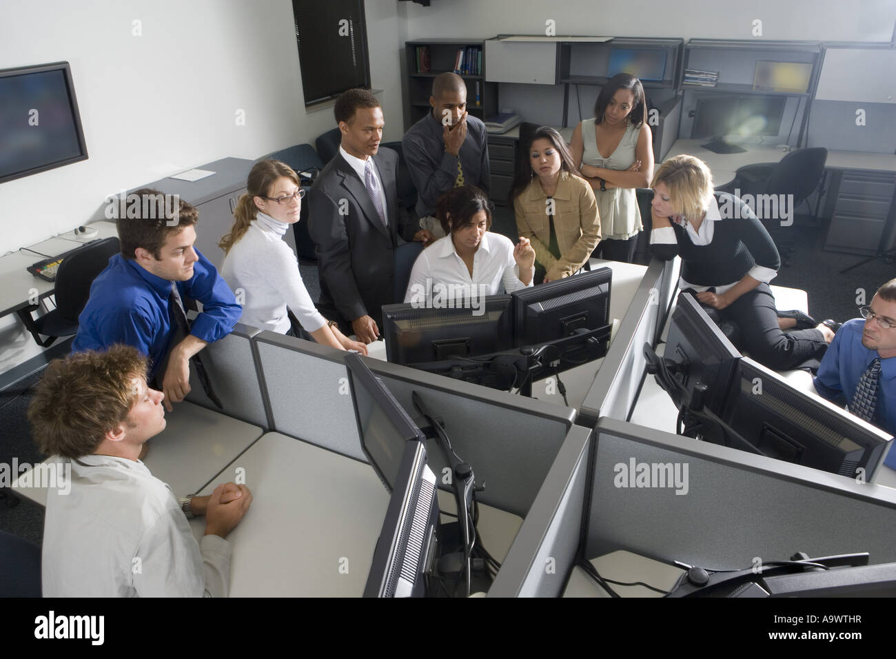 Diverse group workers gathered around hi-res stock photography and ...