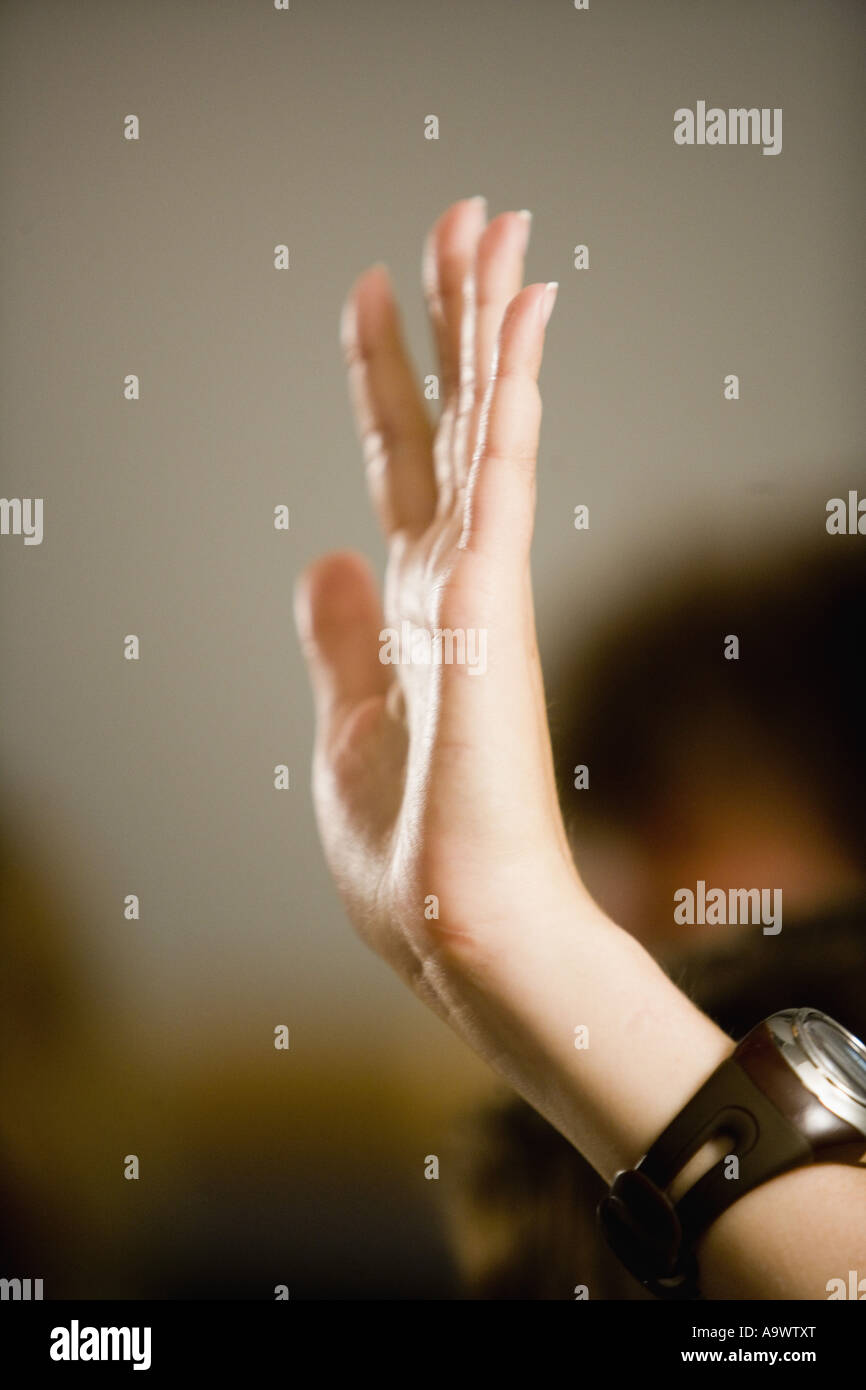 Close-up of a raised hand Stock Photo - Alamy
