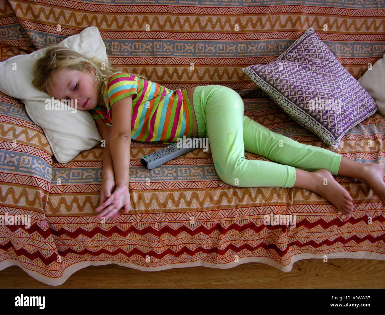 girl at home resting on sofa Stock Photo - Alamy