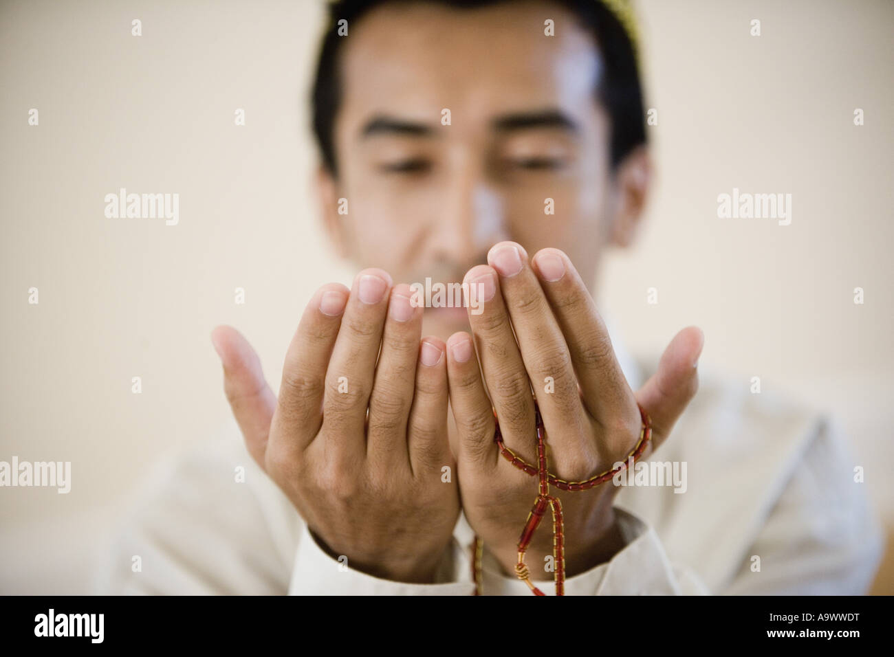 Close-up of hands praying Stock Photo - Alamy