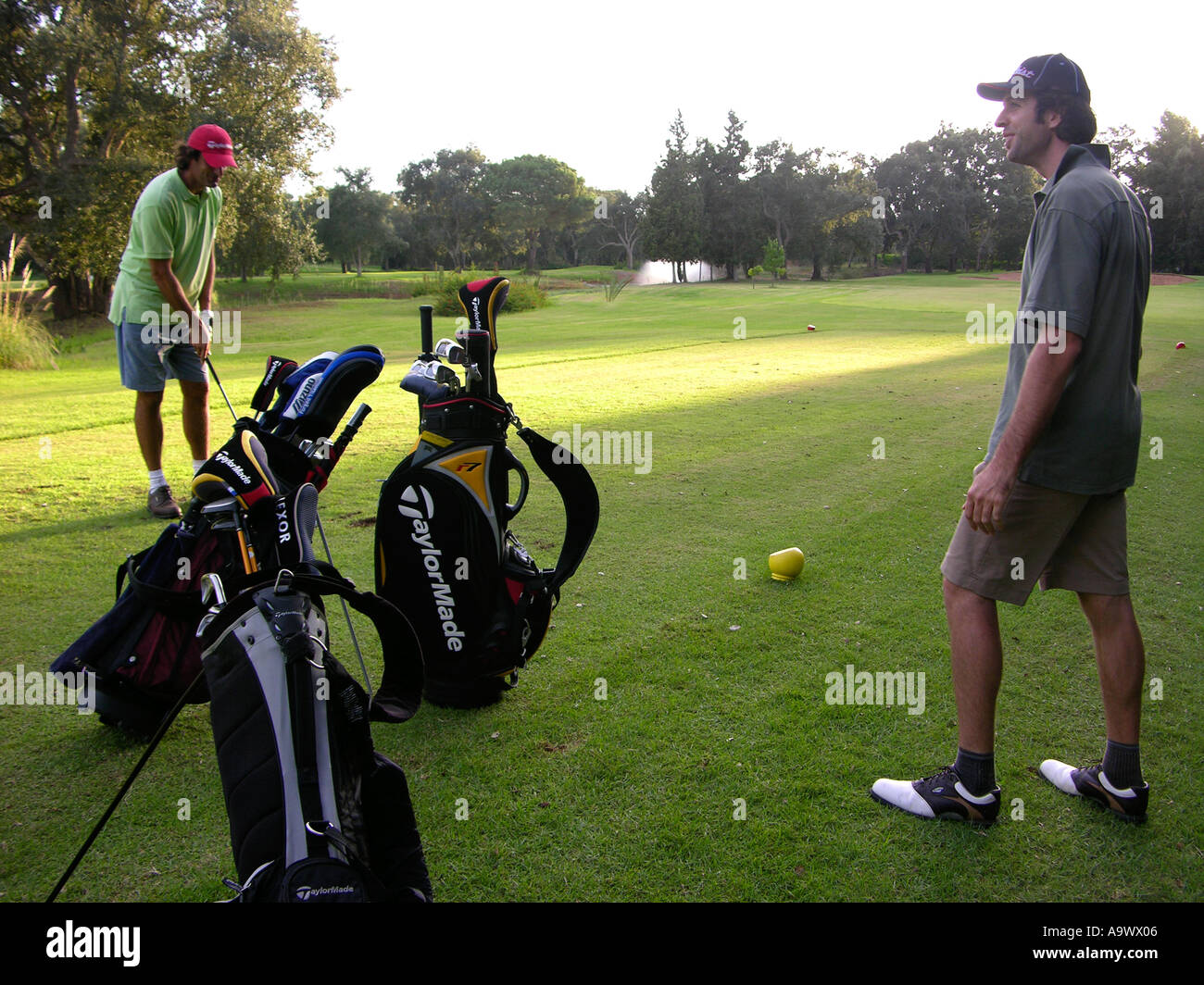 people playing golf Stock Photo - Alamy