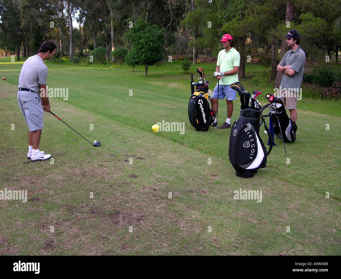 people playing golf Stock Photo - Alamy