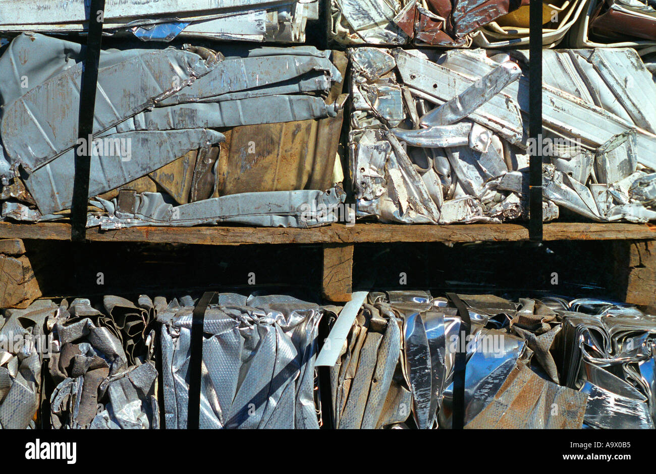 Compressed metal waste ready for recycling Stock Photo - Alamy