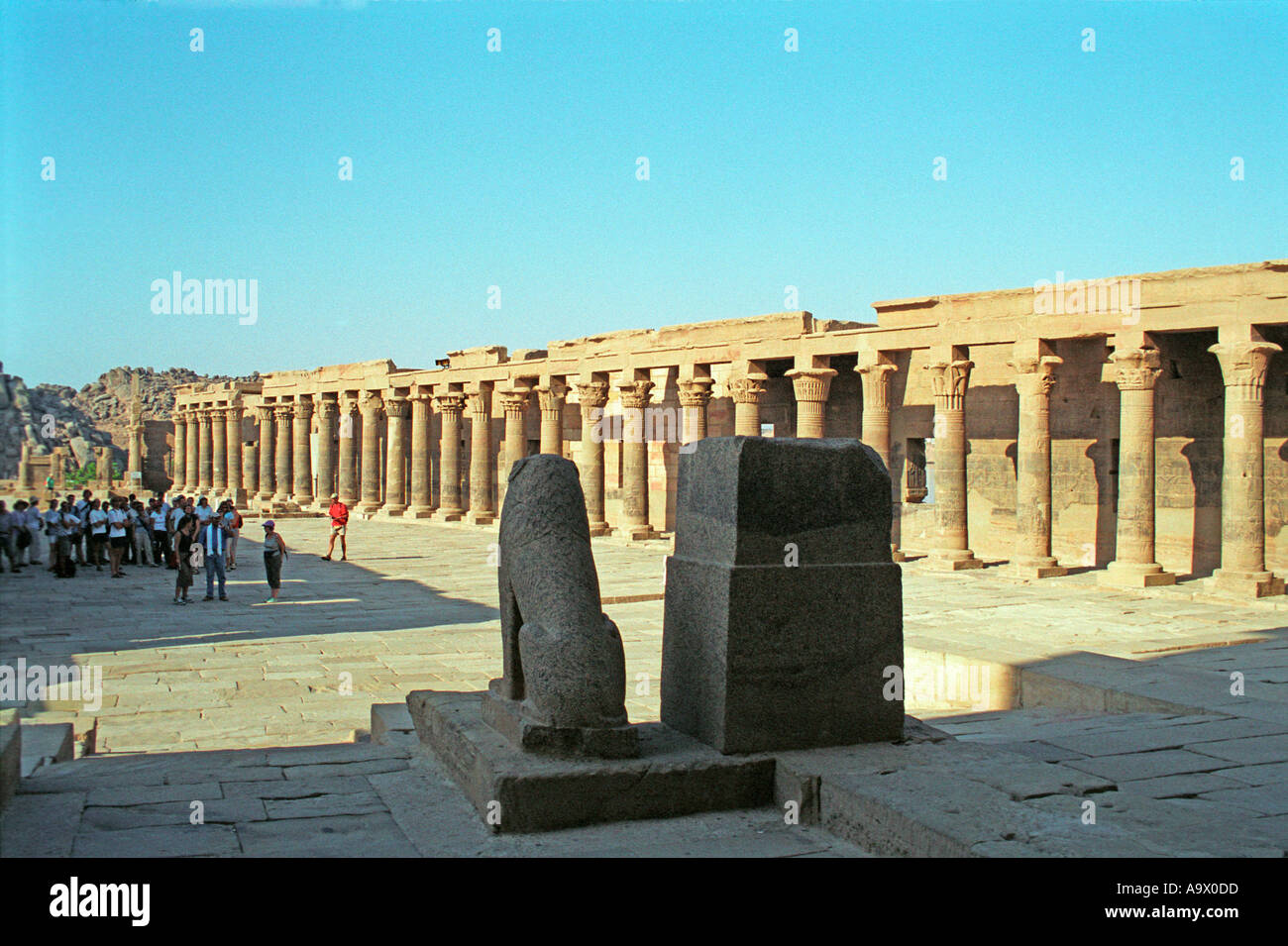 Powerful statues overlook the courtyard at Philae temple on the Nile ...