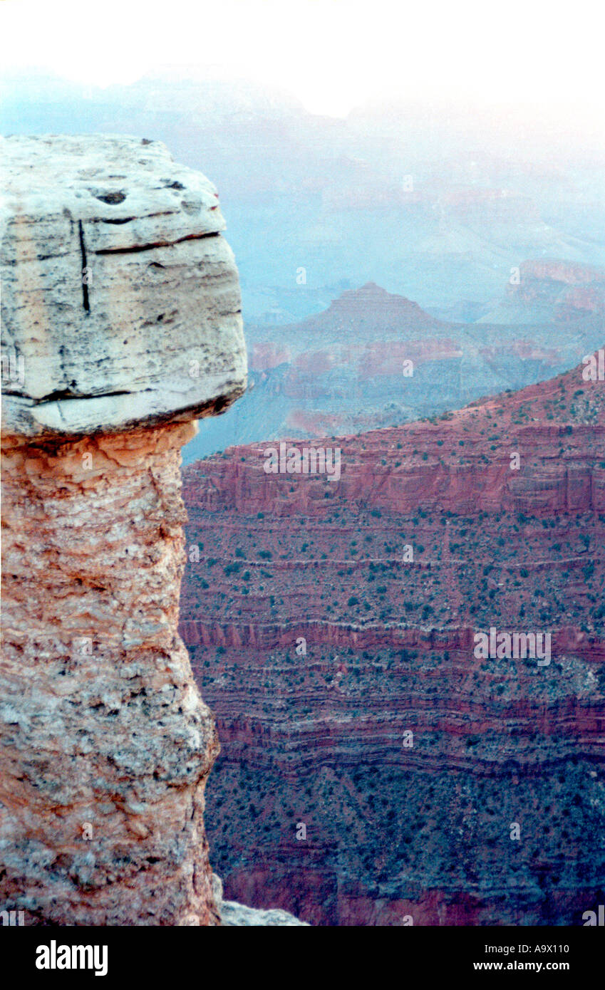 A stone column is ready to greet the sun at the Grand Canyon Stock ...