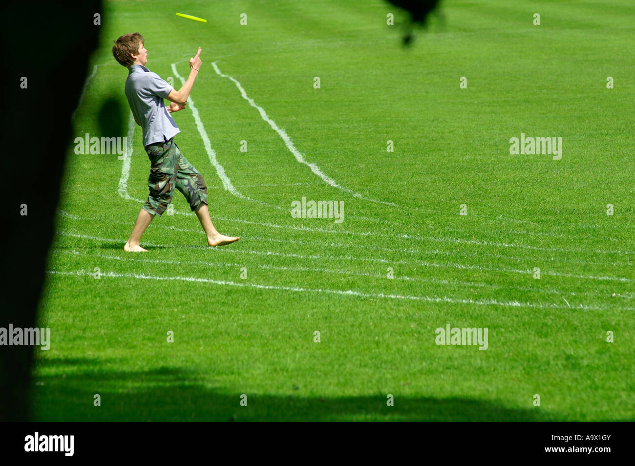 boy playing disc Stock Photo - Alamy