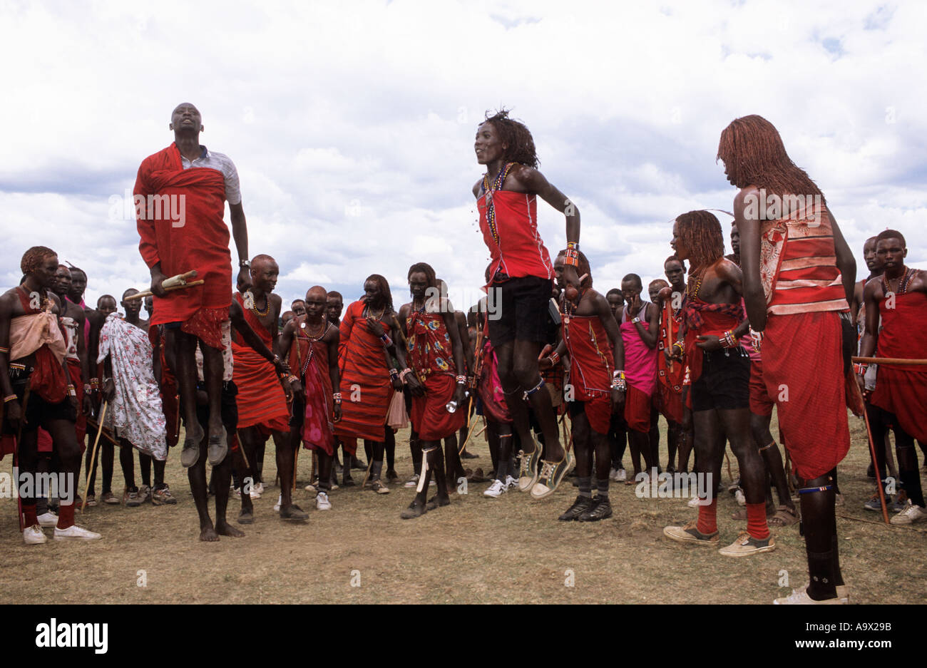 Lolgorian, Kenya. Siria Maasai Manyatta; group of moran doing their ...