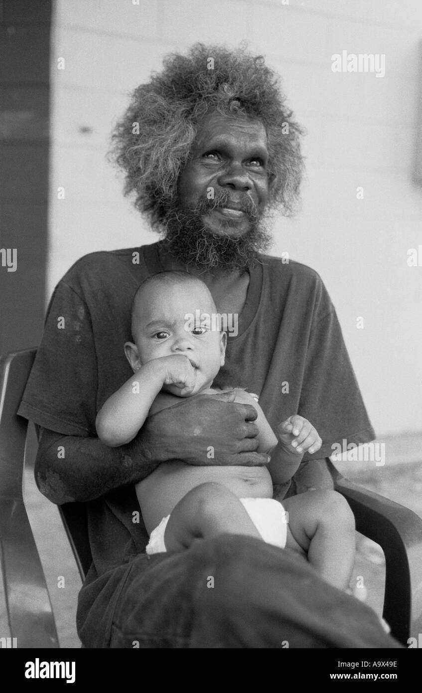 Aboriginal man with baby. Northern Territory, Australia Stock Photo - Alamy