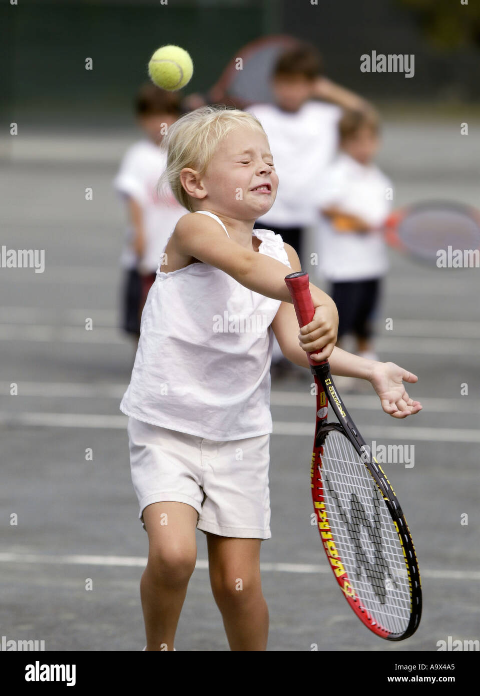 Child tennis lesson hi-res stock photography and images - Alamy