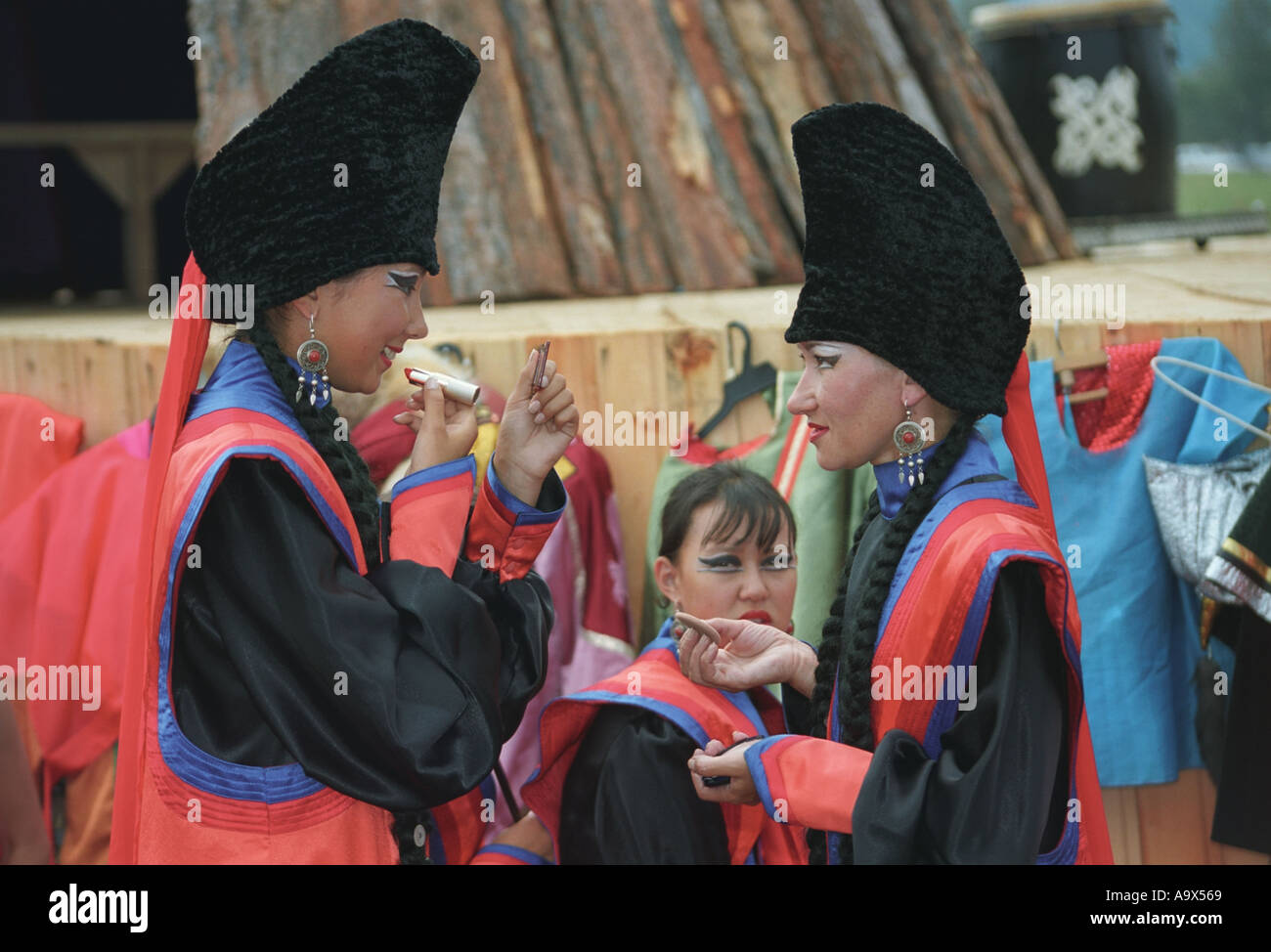 Girls in Altaic national costume are putting on make up National ...