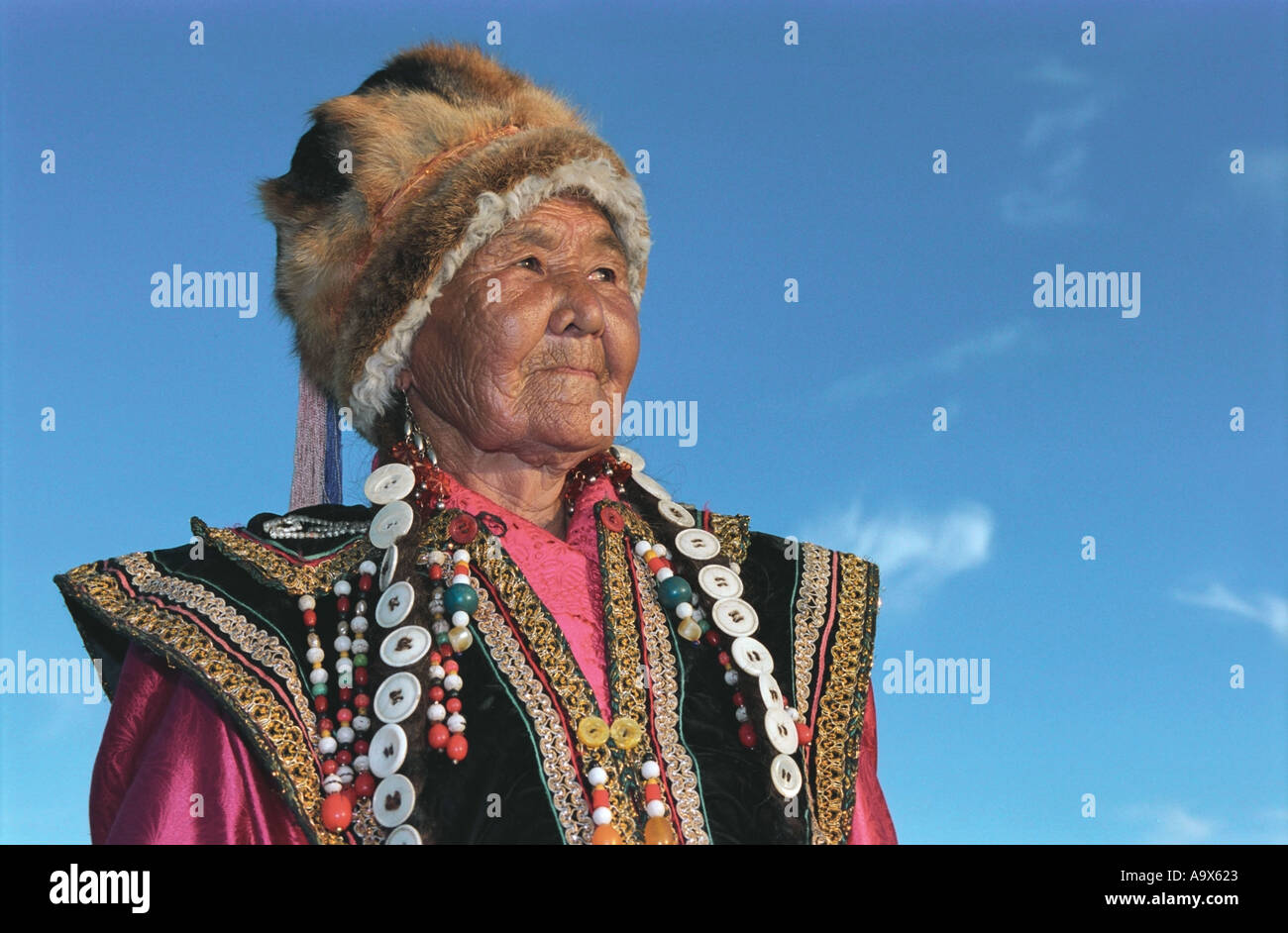 Portrait of an old woman in Altaic costume National Altaian cultural ...