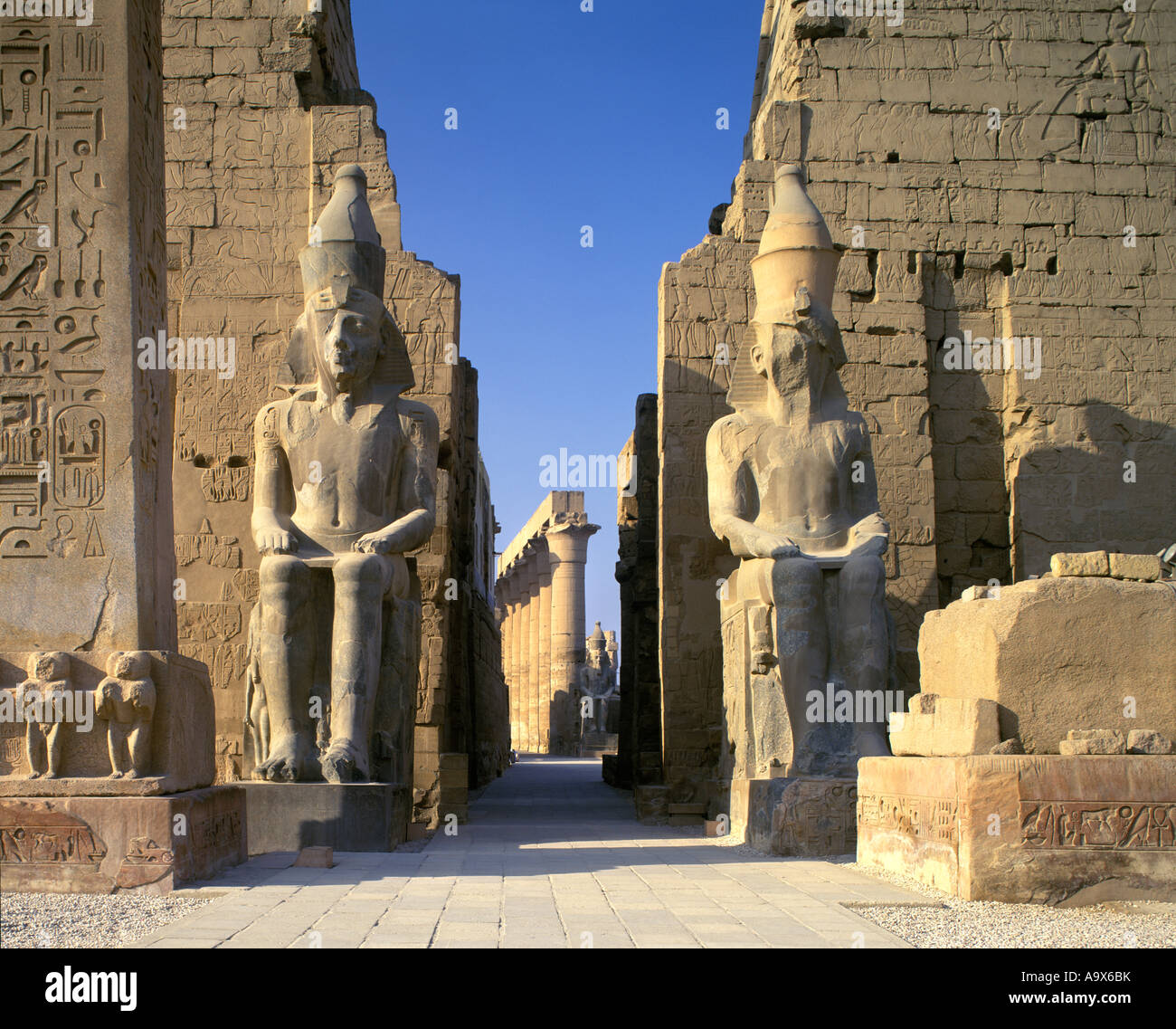 RAMSES II COLOSSI STATUES ENTRANCE PYLON TEMPLE OF LUXOR LUXOR RUINS ...