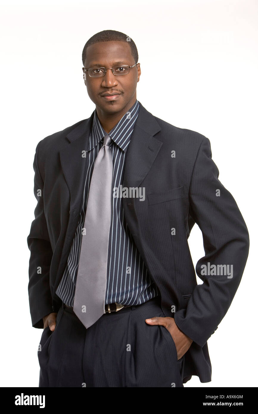 Young black male executive wearing a suit and tie and glasses Stock ...