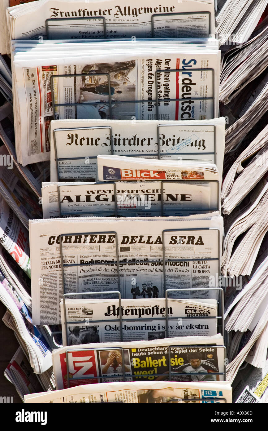 International newspapers on news stand Stock Photo - Alamy
