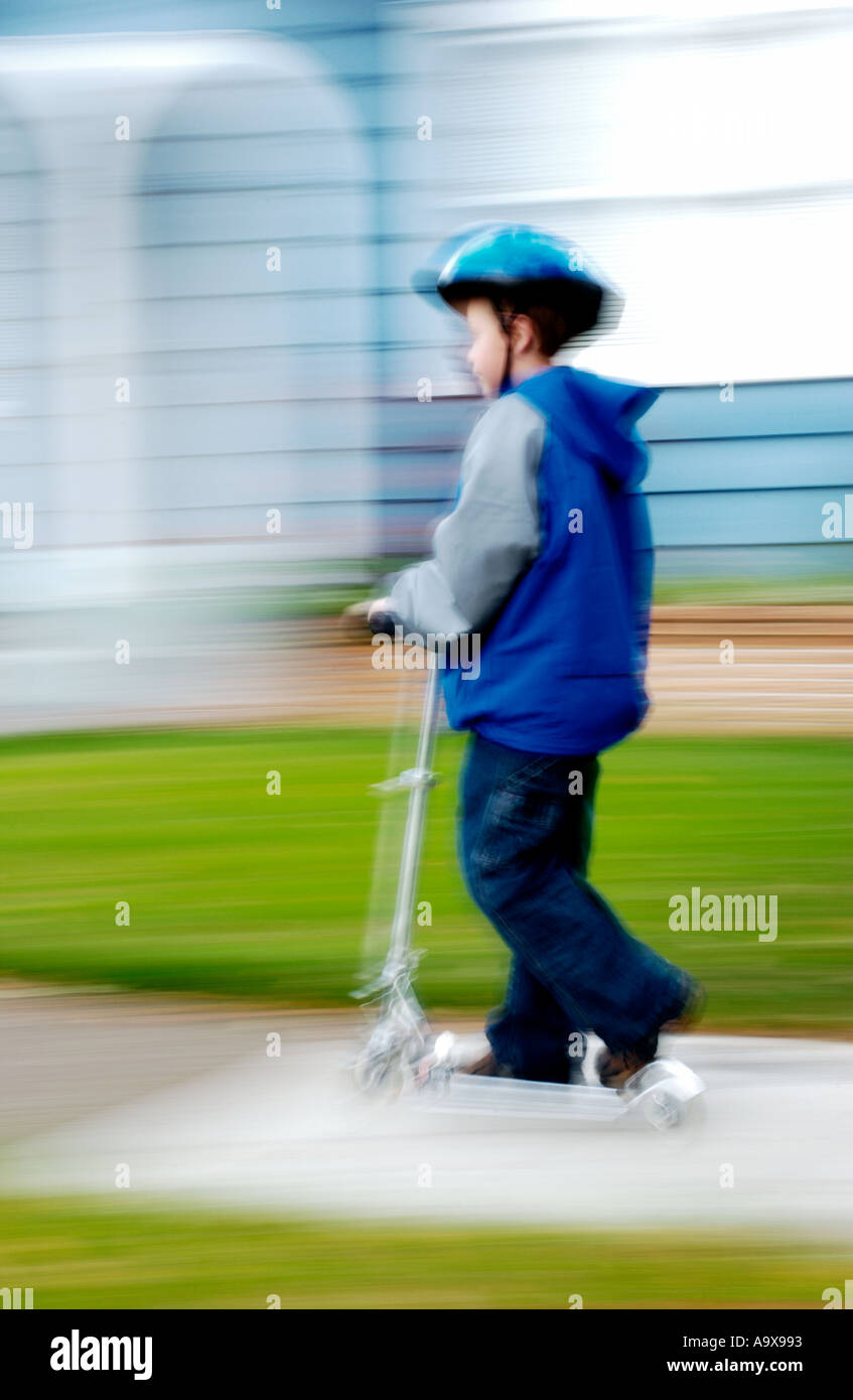 boy riding scooter Stock Photo - Alamy