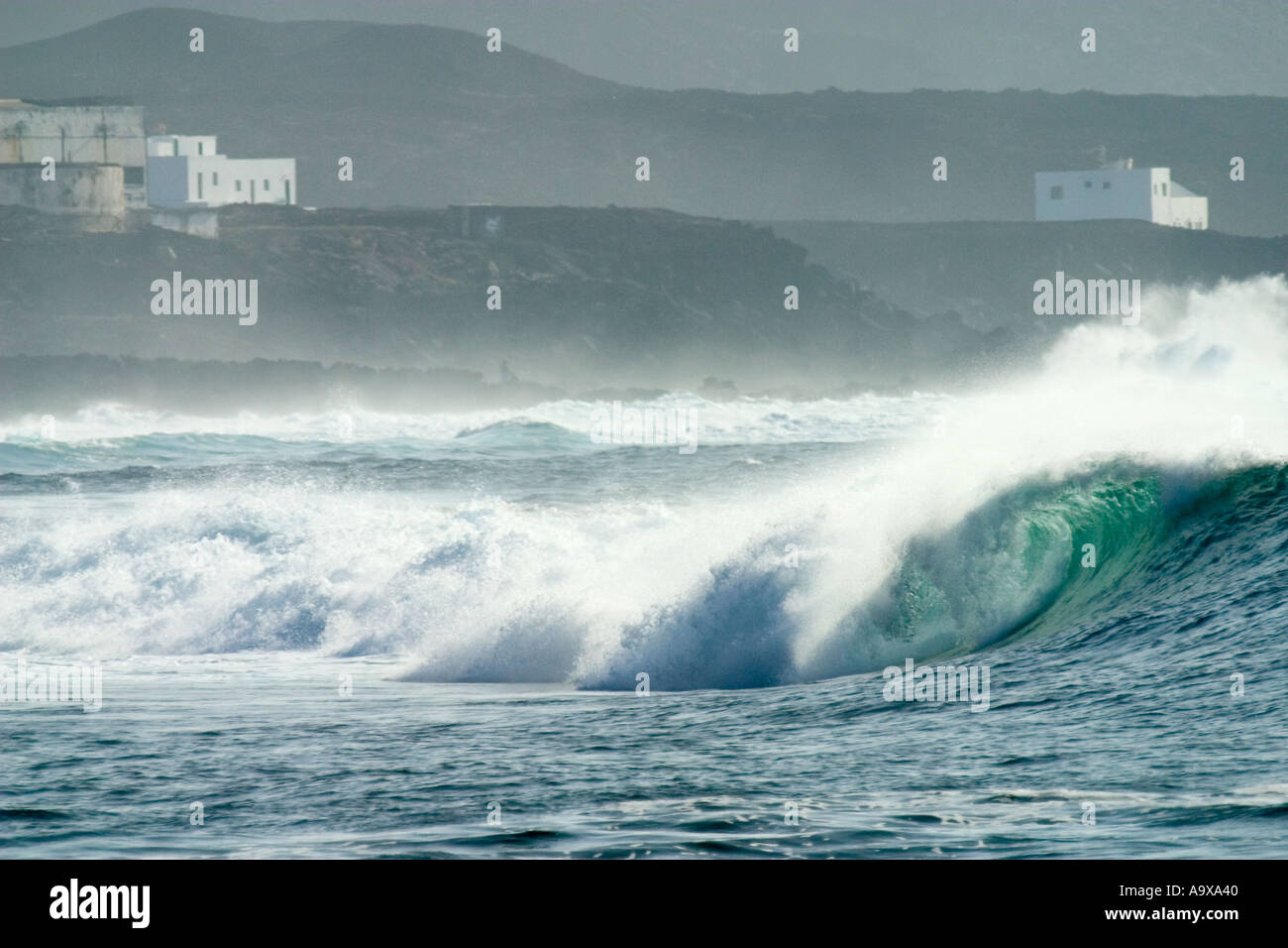 Volcanic Island Wave Stock Photo - Alamy
