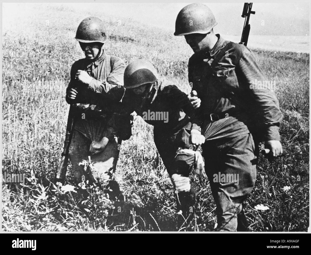 Soviet Soldier Helped Stock Photo - Alamy