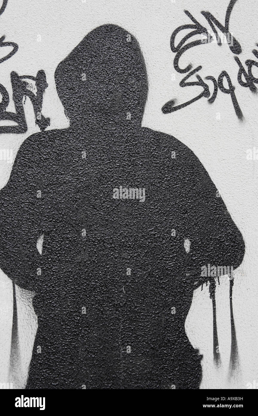 Graffiti of hoodie sprayed on wall Stock Photo - Alamy
