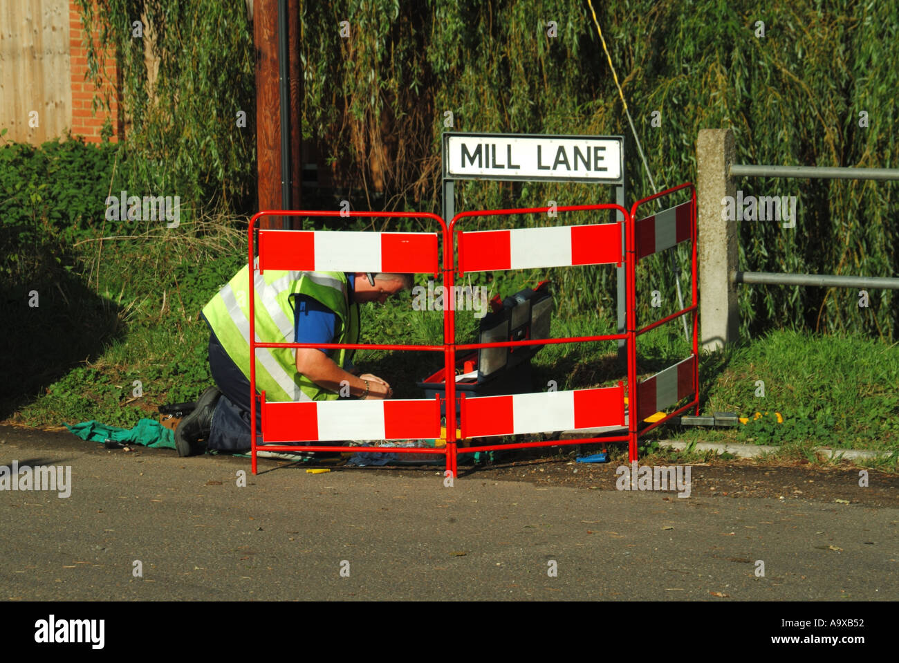Working in manhole hi-res stock photography and images - Alamy