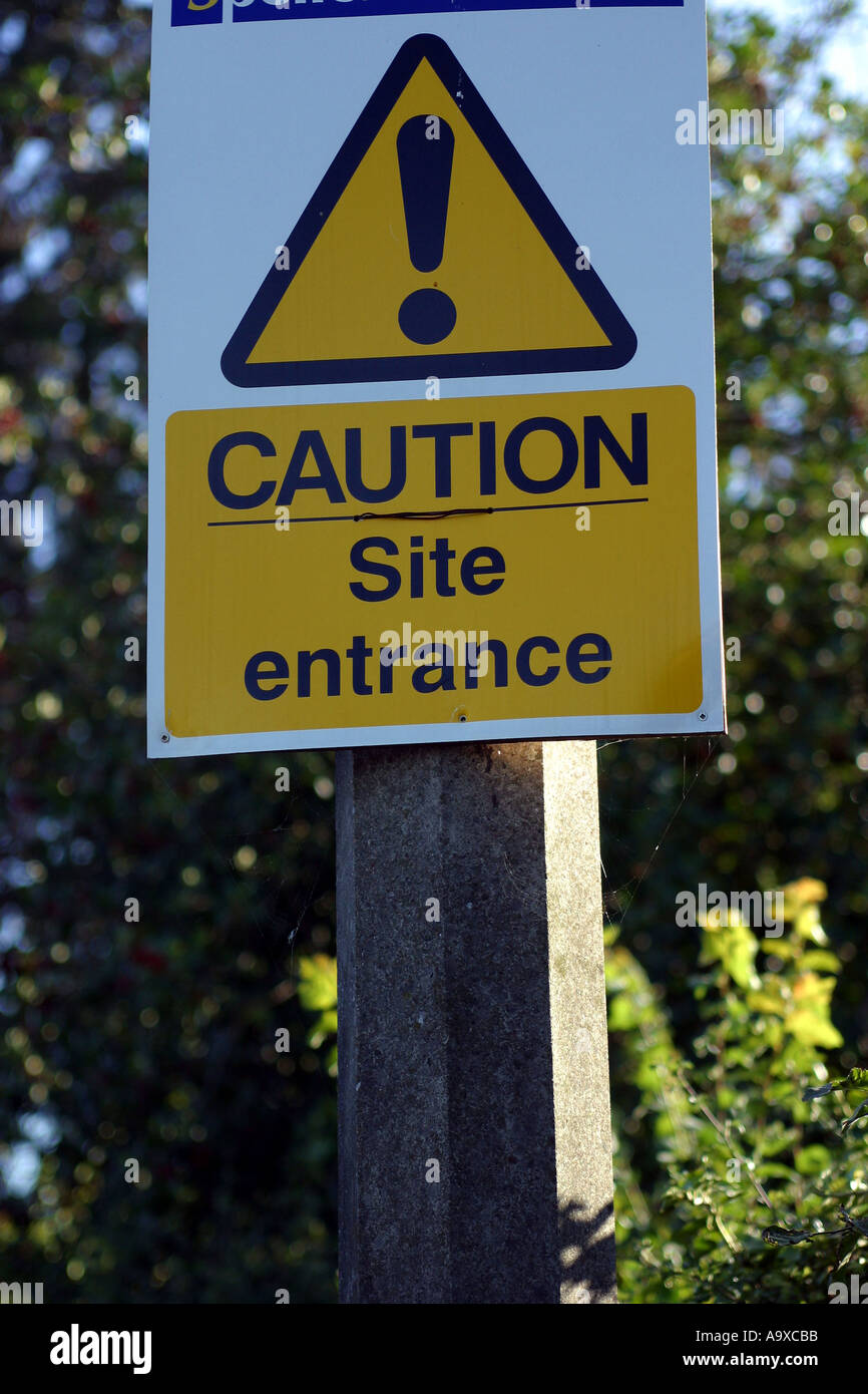 caution site entrance sign Stock Photo - Alamy