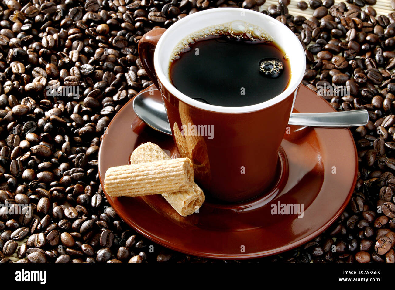 Cup with Coffee and Coffee beans Stock Photo - Alamy