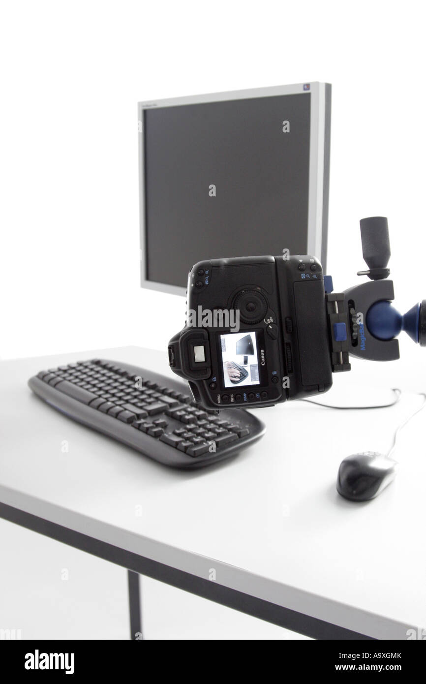 writing desk with computer getting photographed in the studio Stock ...