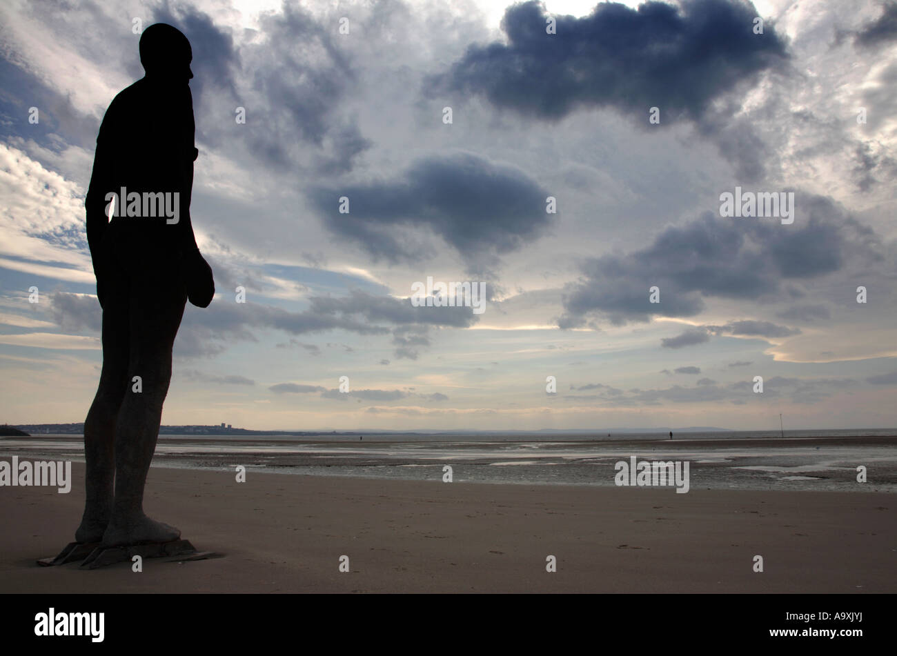 Antony Gormley s Another Place - 100 statues at Crosby Beach Stock ...