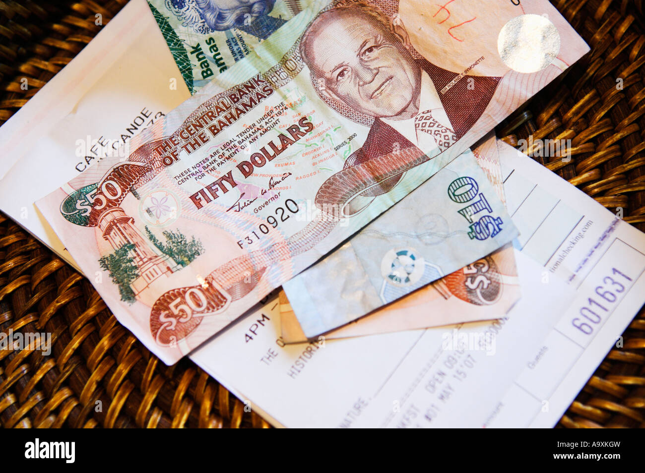 Bahamian currency on tray paying restaurant bill Stock Photo - Alamy