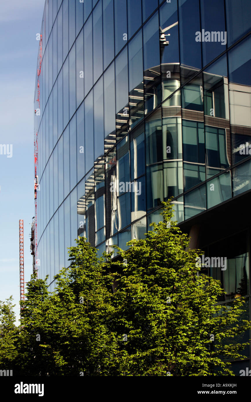 MEN Building reflected in the RBS Building Manchester Stock Photo - Alamy