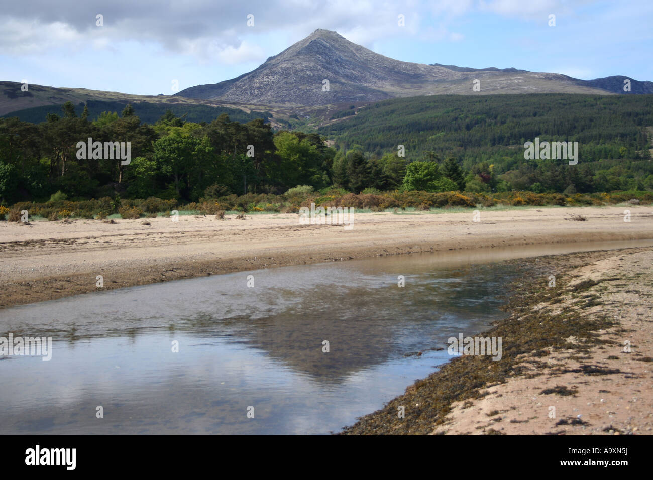 beach near Brodick with reflection of Goatfell Arran Scotland May 2007 ...