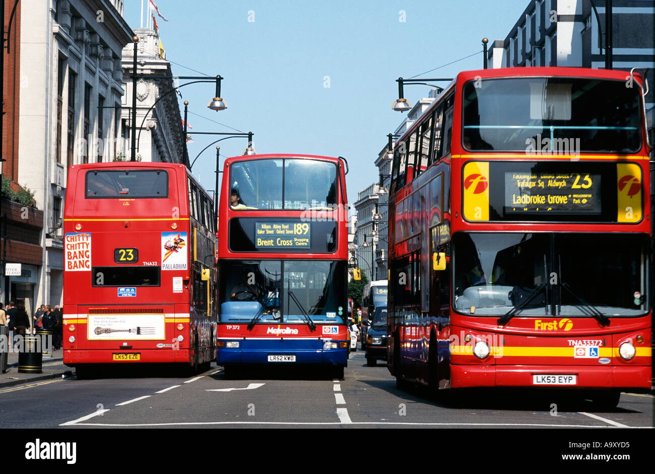 Red London Double Decker Buses in Oxford Street Stock Photo - Alamy