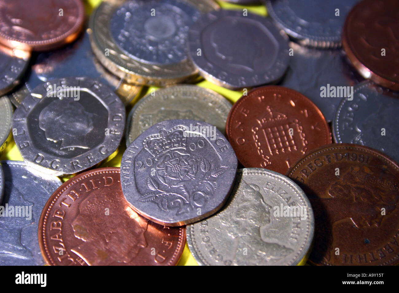 A pile of coins or loose change Stock Photo - Alamy