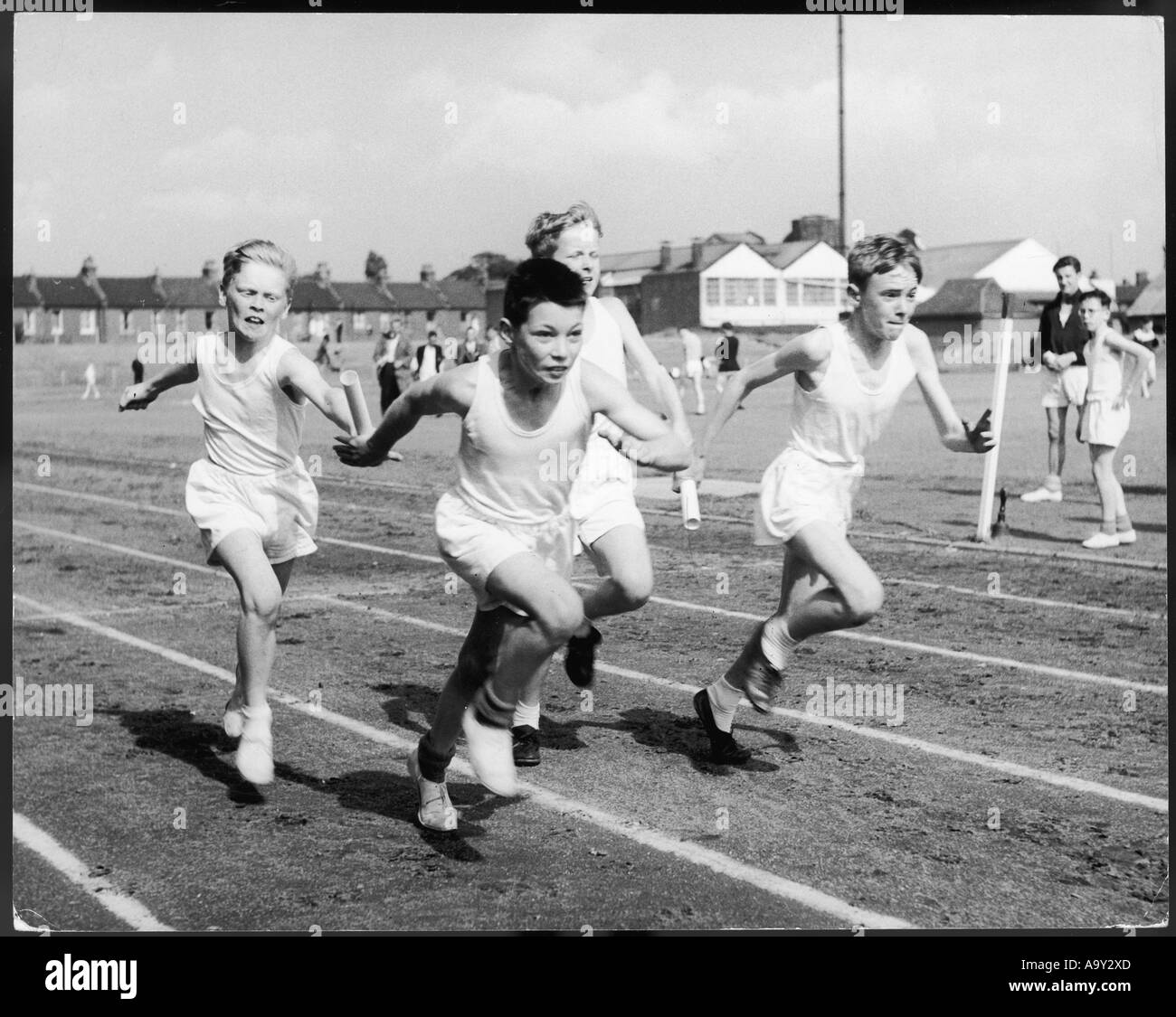 Relay race running sports Black and White Stock Photos & Images - Alamy