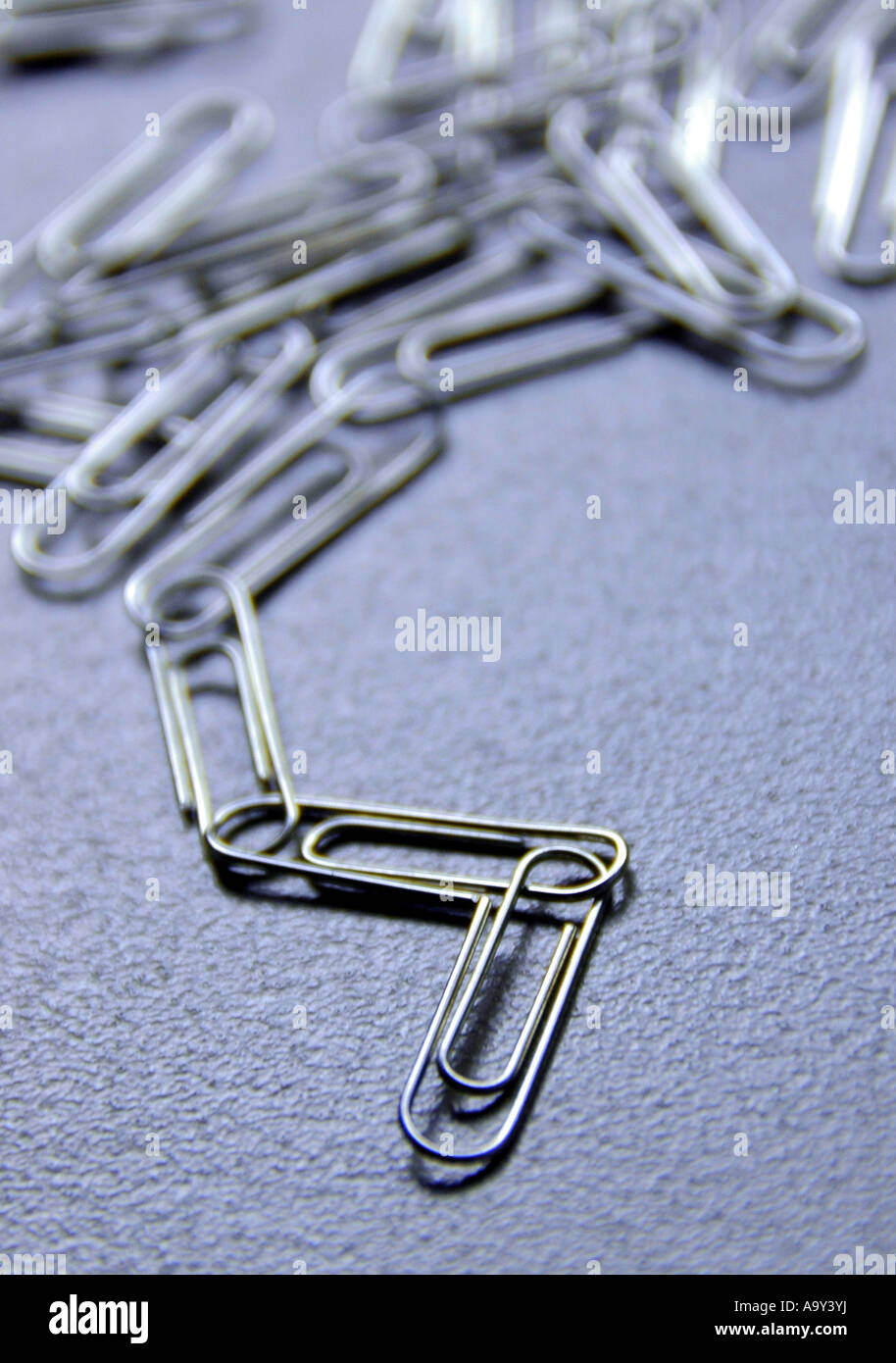 Paper clips forming a link Stock Photo - Alamy