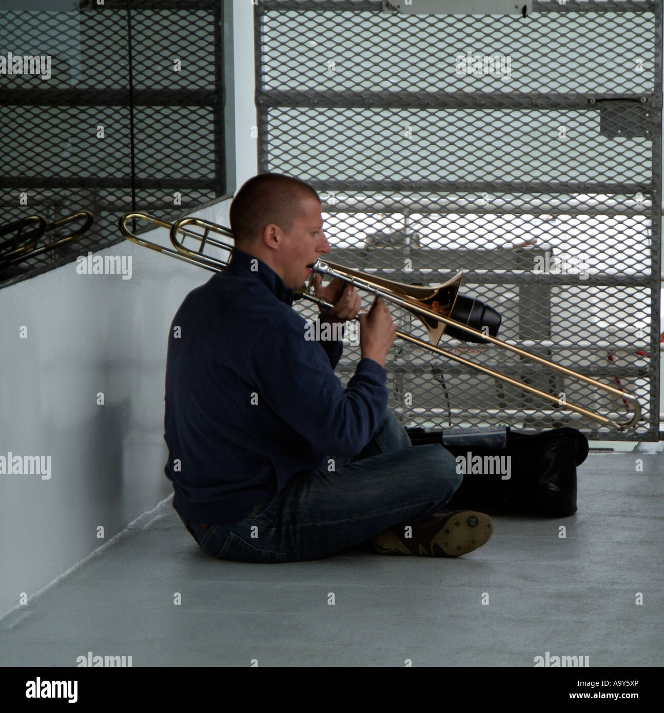 Learning trombone hi-res stock photography and images - Alamy
