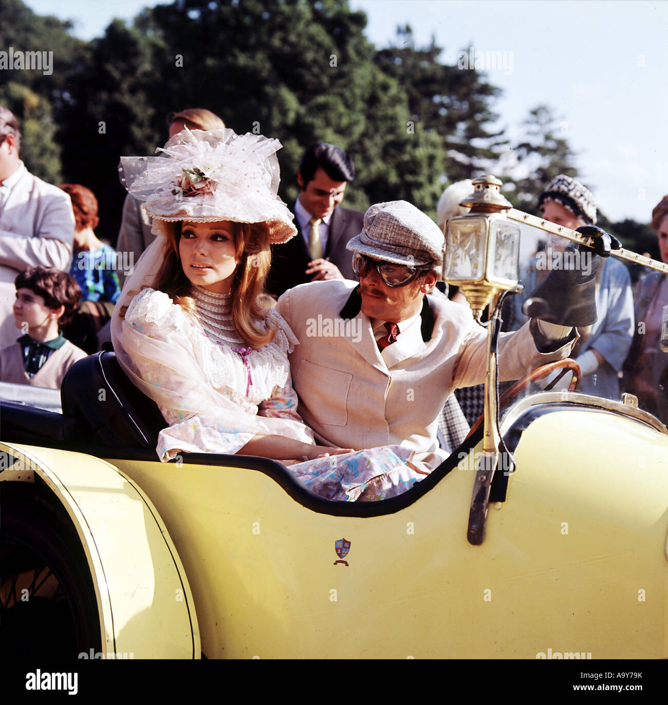 CROSSPLOT - Roger Moore with Claudie Lange while filming the 1969 film ...
