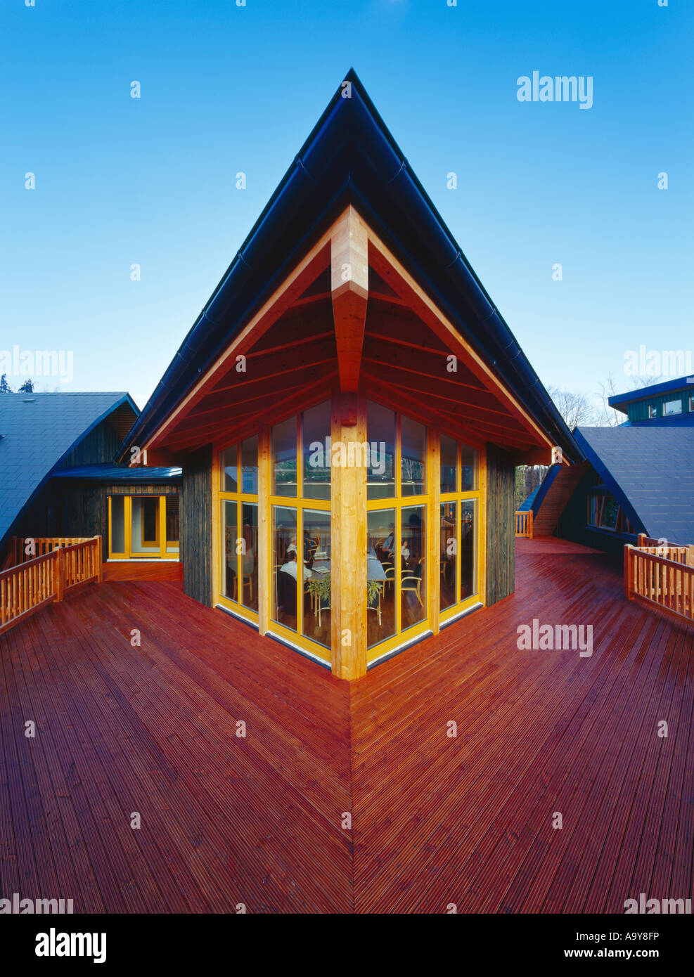 wooden building constructed with exagerated angles Stock Photo - Alamy