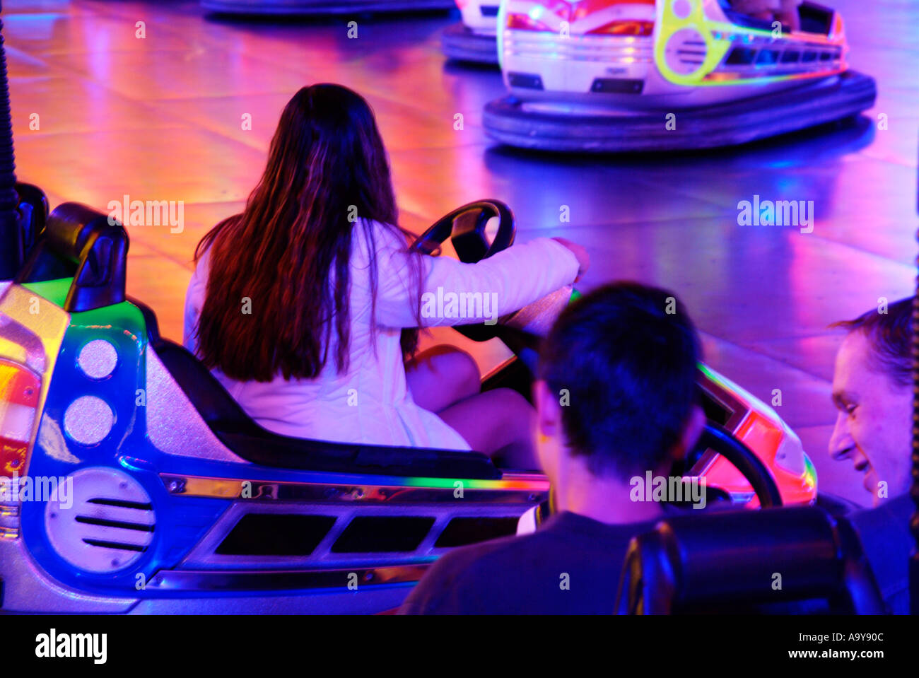 Children driving bumper cars hi-res stock photography and images - Alamy