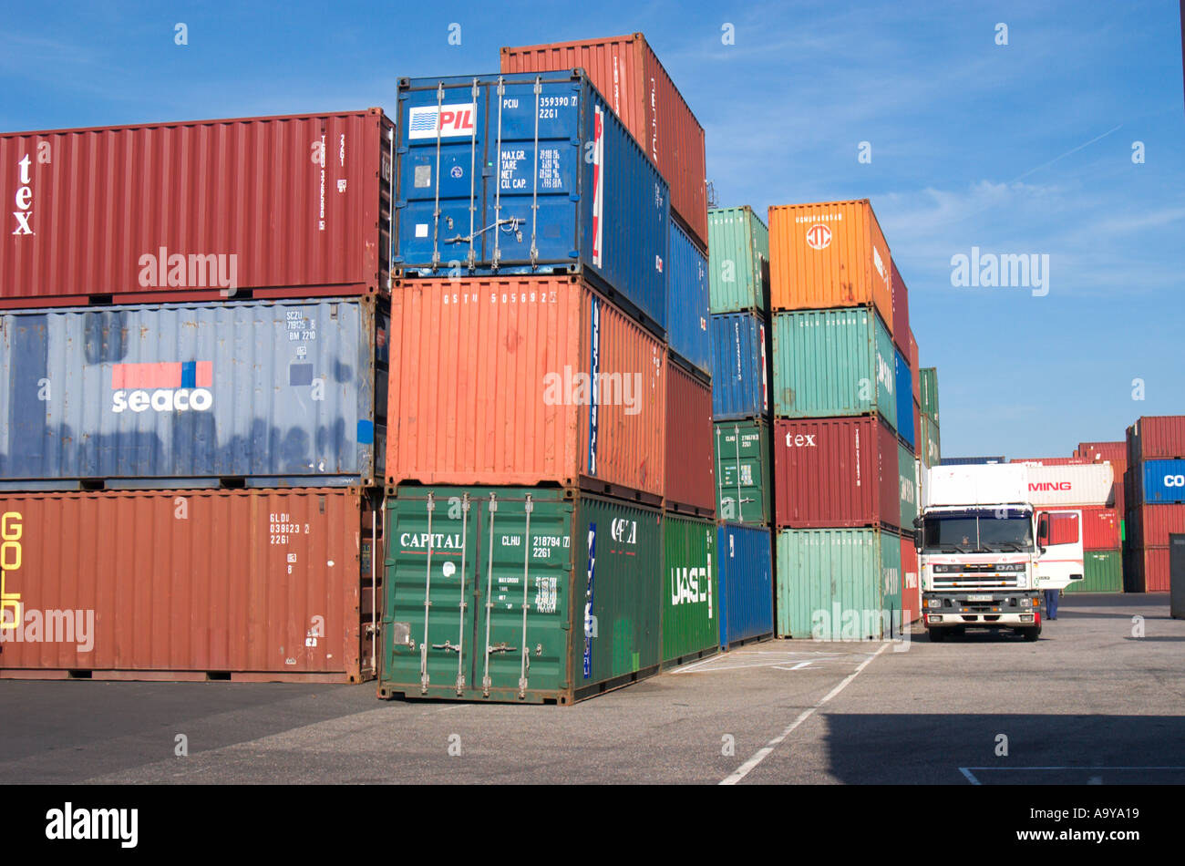 freight containers and truck in container terminal Stock Photo - Alamy