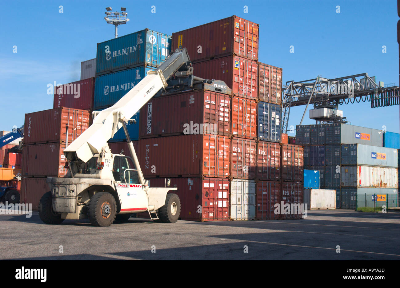 lifter loader moving freight container in container terminal Stock ...