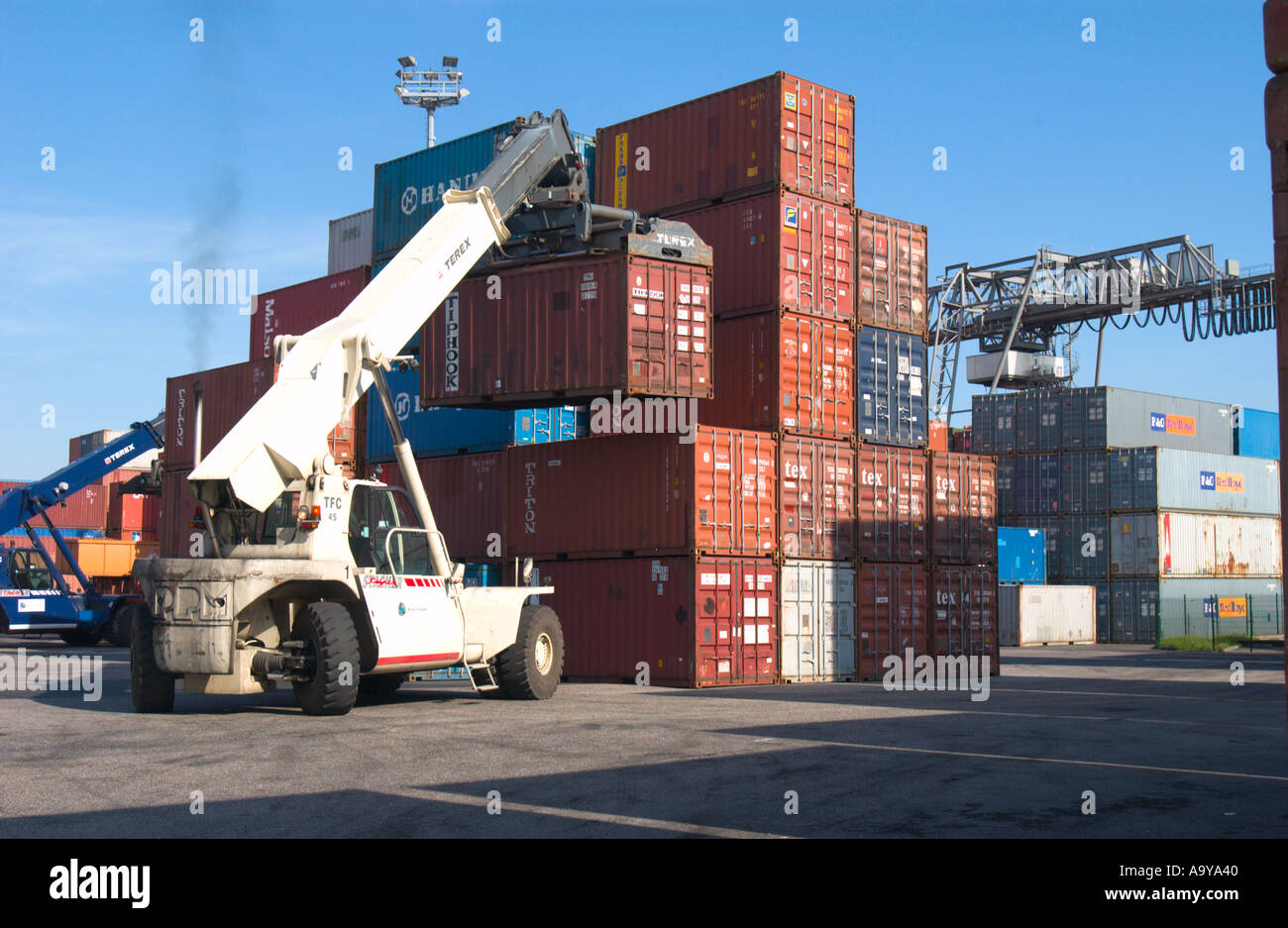 lifter loader moving freight container in container terminal Stock ...